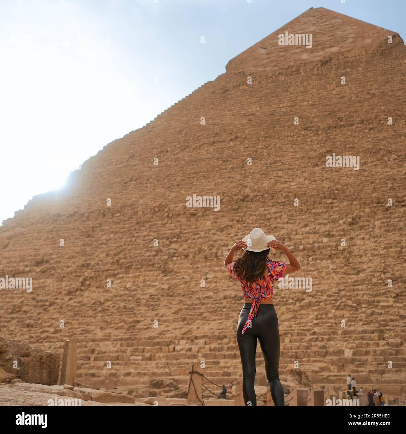 Tall Beautiful Young Girl Looking at the Pyramid of Giza in sunshine ...