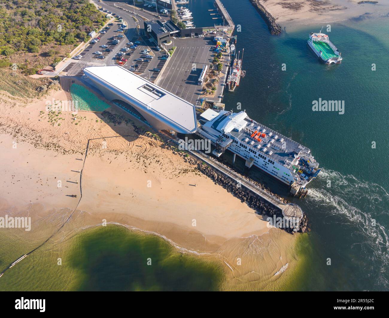 Aerial view of a ferry docked at a transit terminal at Queenscliff in ...