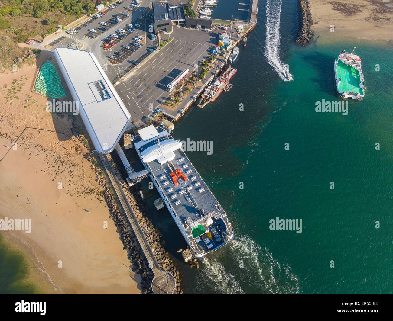 Aerial view of a ferry docked at a transit terminal at Queenscliff in ...