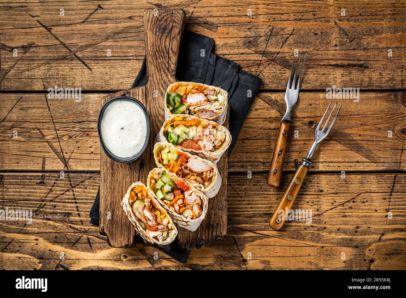 Chicken wrap roll, durum doner kebab with meat and vegetable salad ...