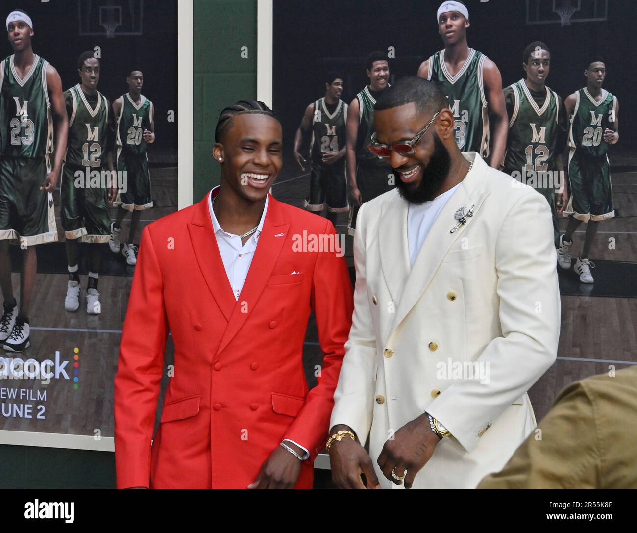 LeBron James (L) and cast member Marquis "Mookie" Cook attend the ...