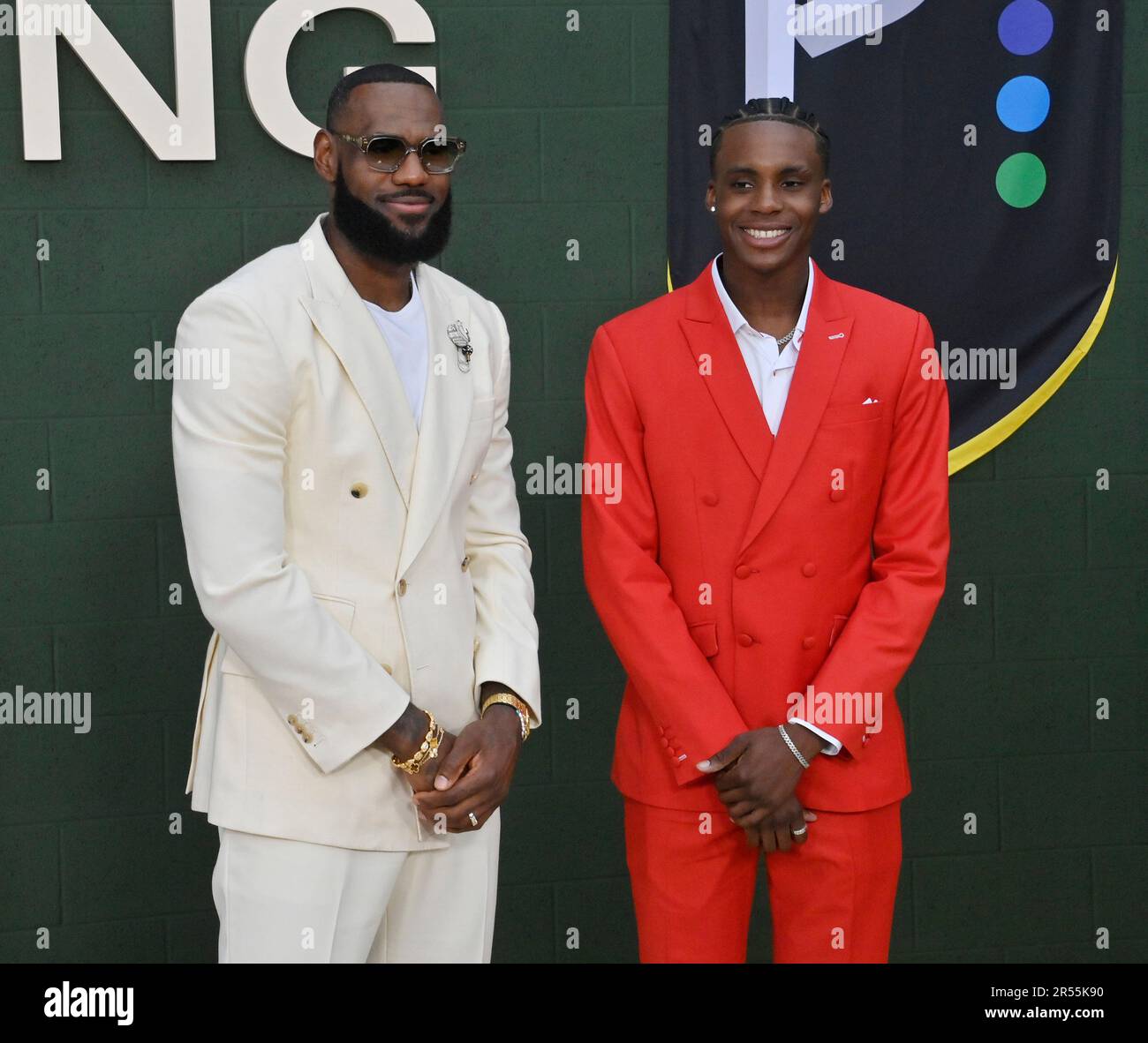 LeBron James (L) and cast member Marquis "Mookie" Cook attend the ...