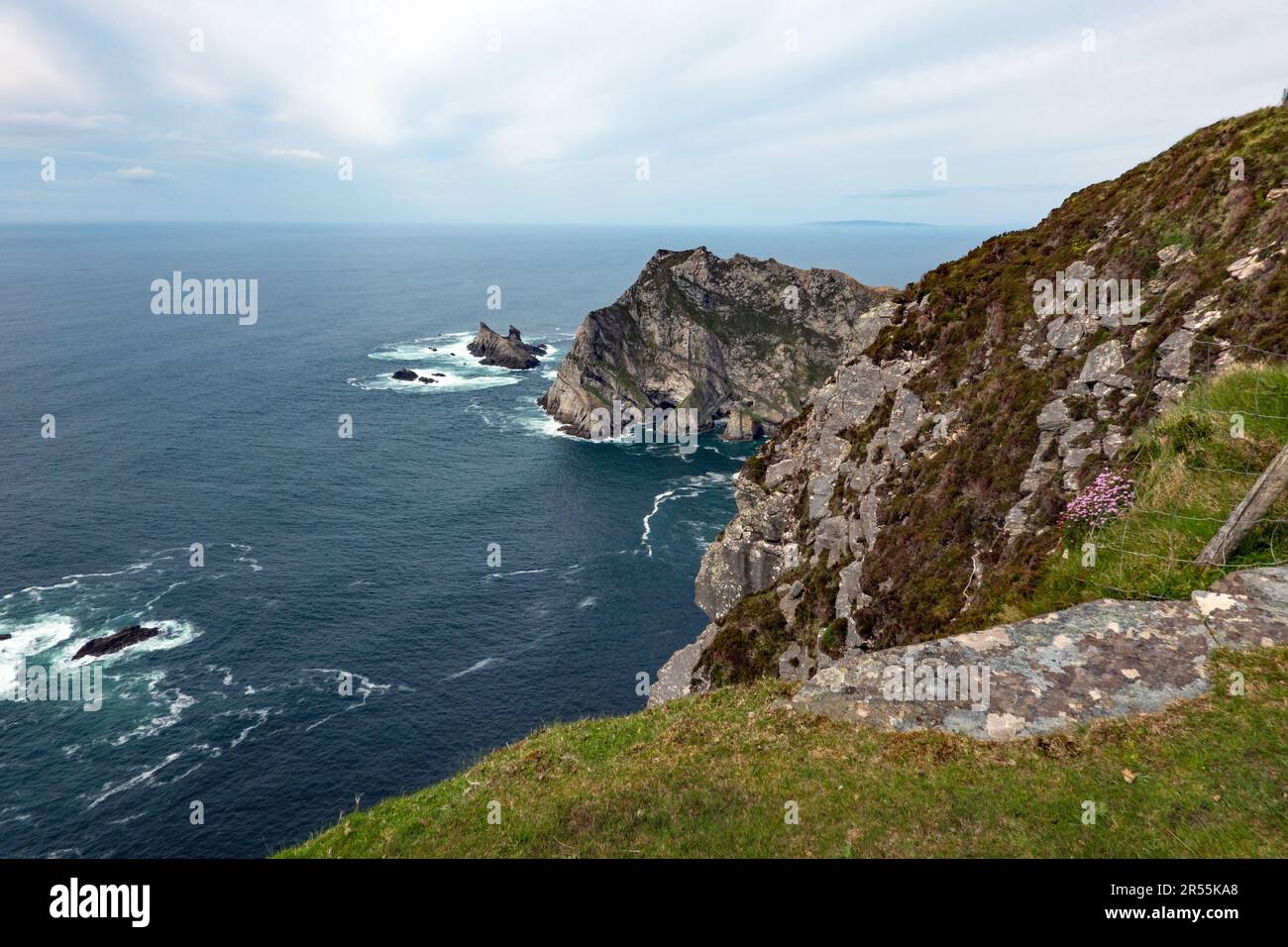 Coastal walk with view on the Sturrall Head cliff in Co, Donegal ...