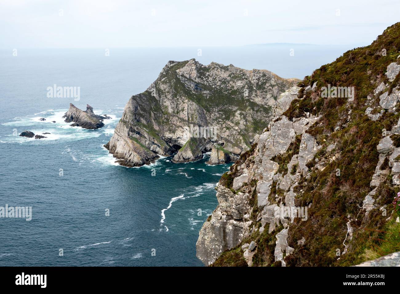 Coastal walk with view on the Sturrall Head cliff in Co, Donegal ...