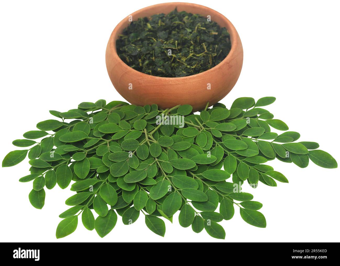 Moringa leaves fresh and crushed in a bowl Stock Photo - Alamy