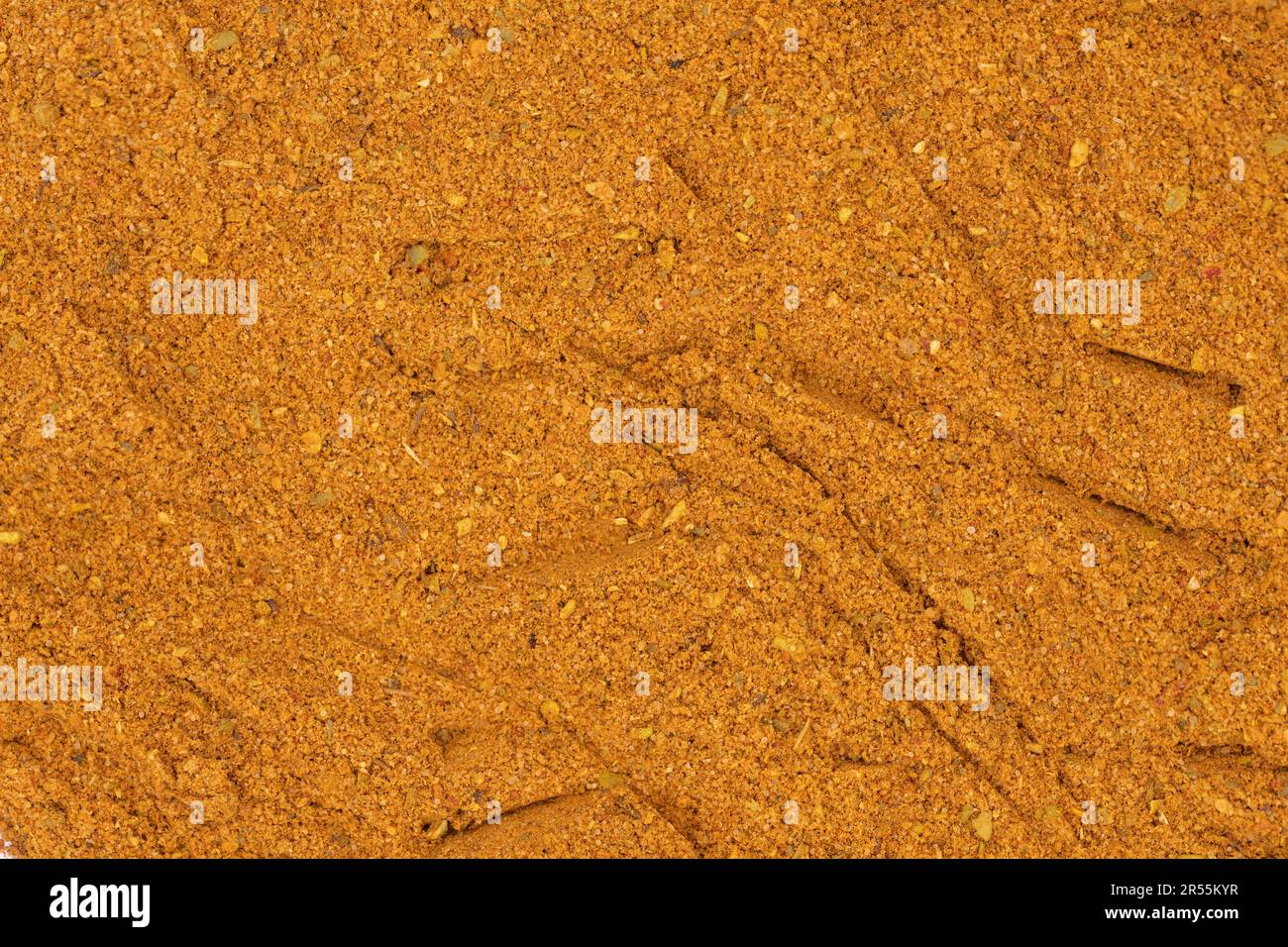 Pile of cajun powder as background, spice or seasoning as background ...