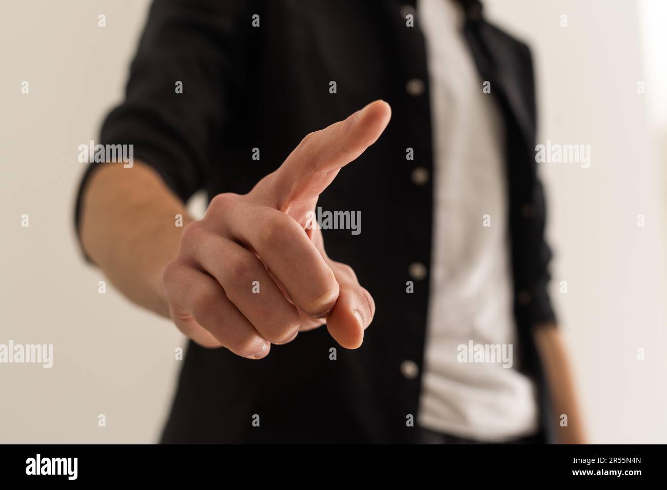 Hand pointing at observer isolated on white background Stock Photo - Alamy