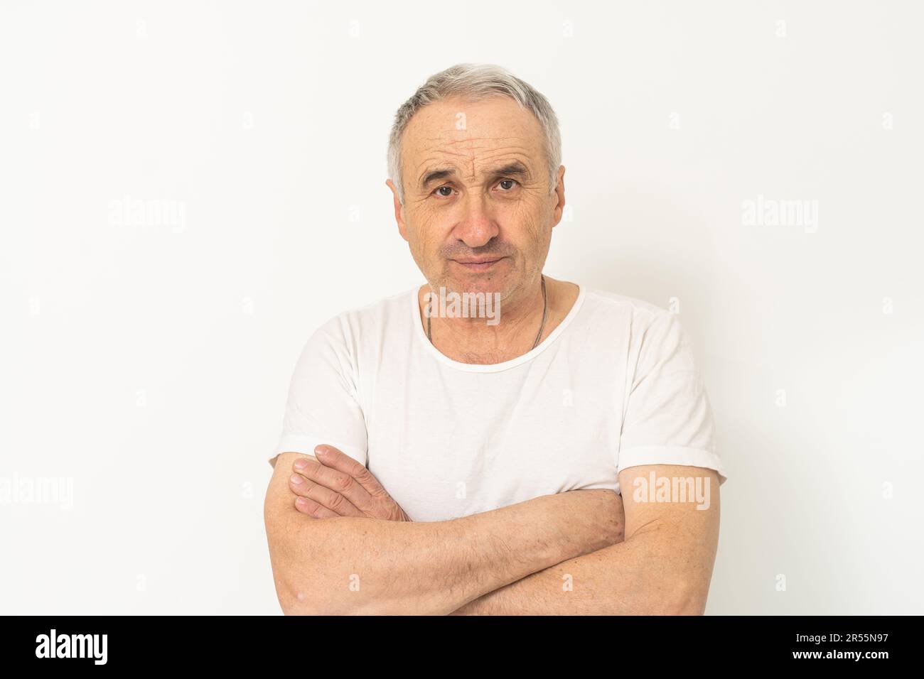 an elderly man on a white background Stock Photo - Alamy