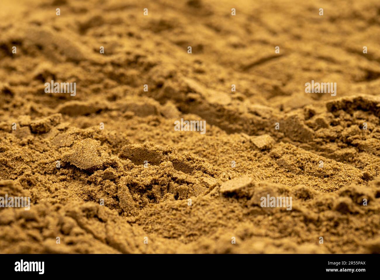 Pile of allspice powder as background, spice or seasoning as background ...