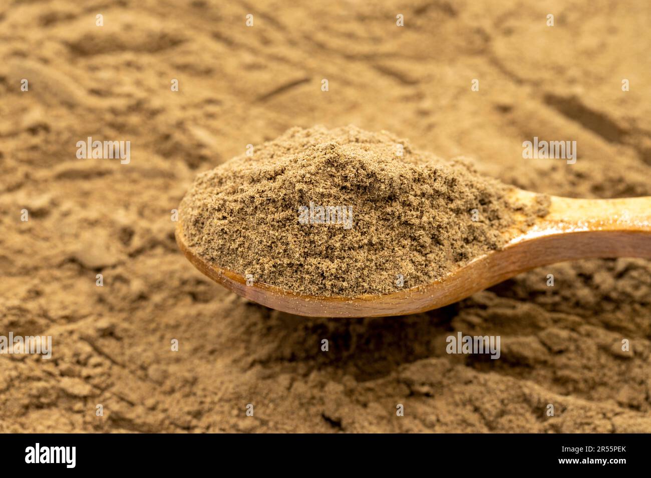 Pile of allspice powder as background, spice or seasoning as background ...