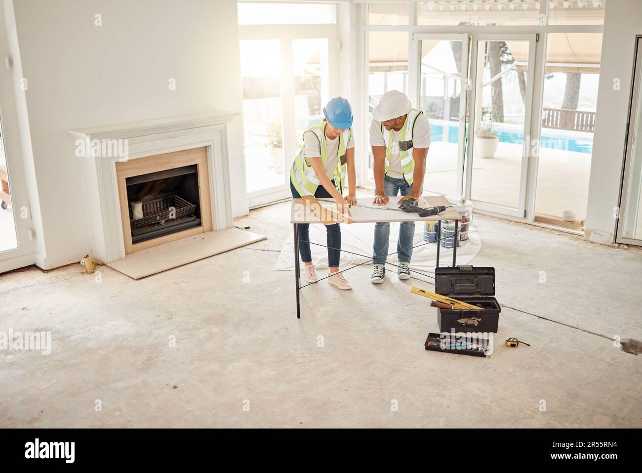 Architect, construction and home renovation team at table for maintenance or architecture ...