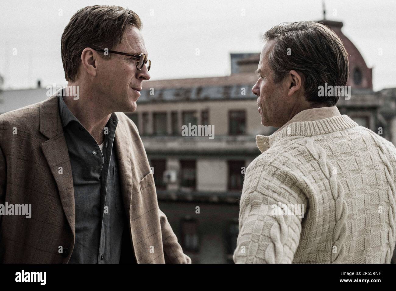 GUY PEARCE and DAMIAN LEWIS in A SPY AMONG FRIENDS (2022), directed by ...