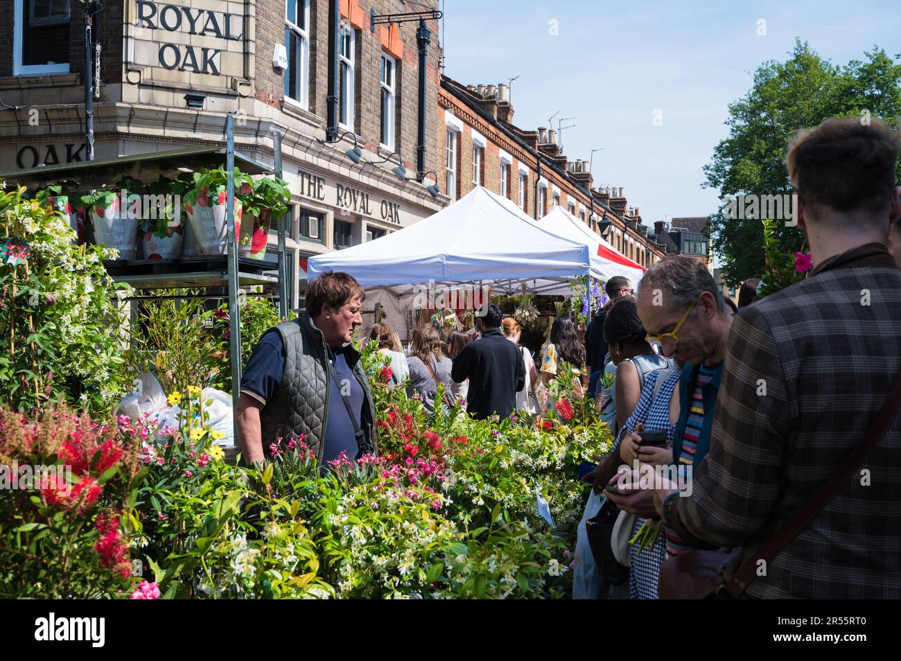 People throng Columbia Road Flower Market to buy plants and flowers on ...