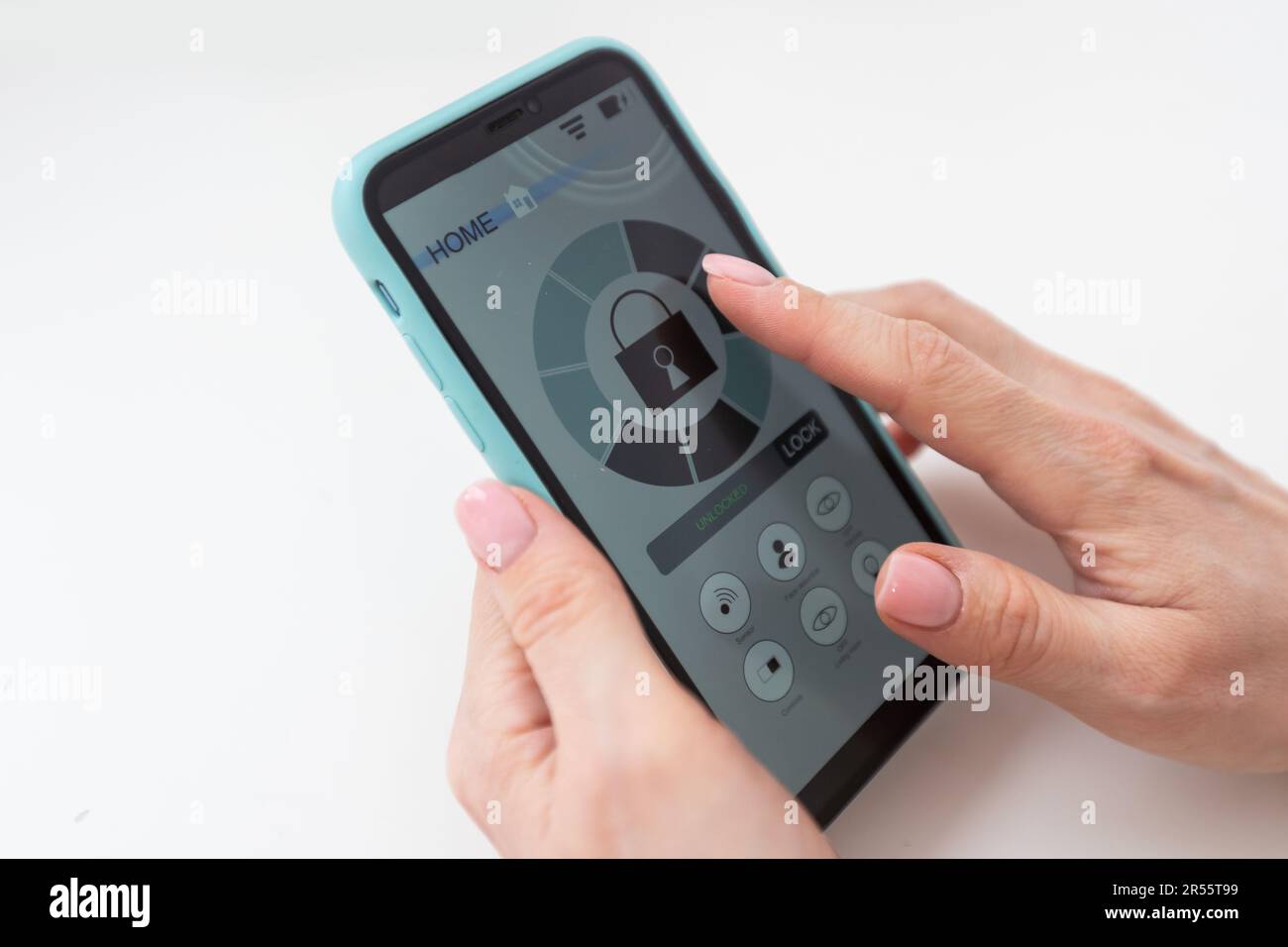 Young woman holding smart phone with launched security application at ...