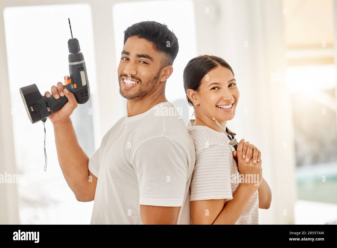 Portrait couple man woman repairs hi-res stock photography and images ...
