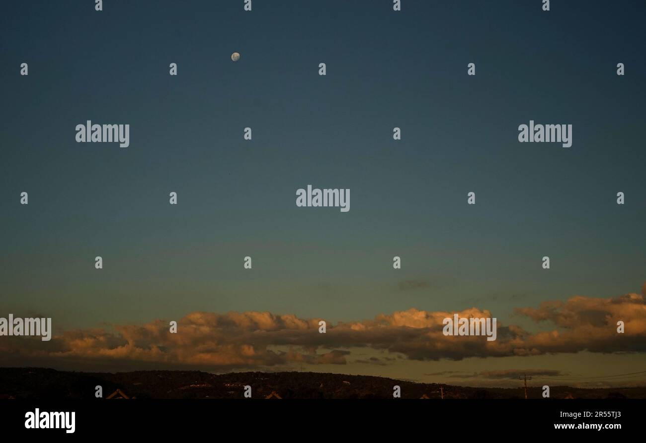 Perth, Western Australia - June 1st 2023: The moon shines over over a ...