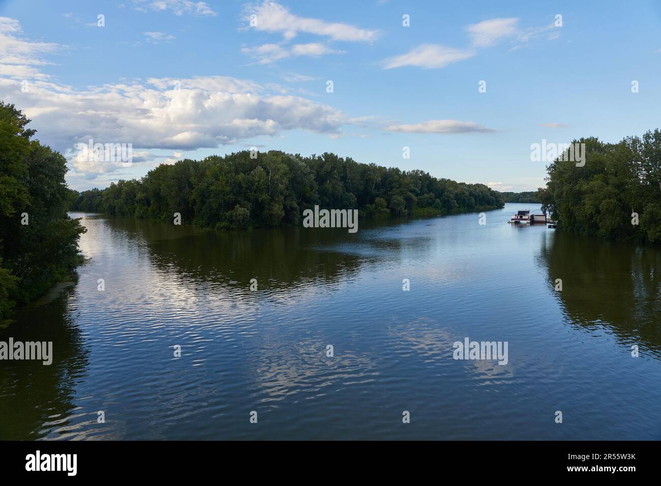 Peaceful waters of rivers merging, summer landscape Stock Photo - Alamy