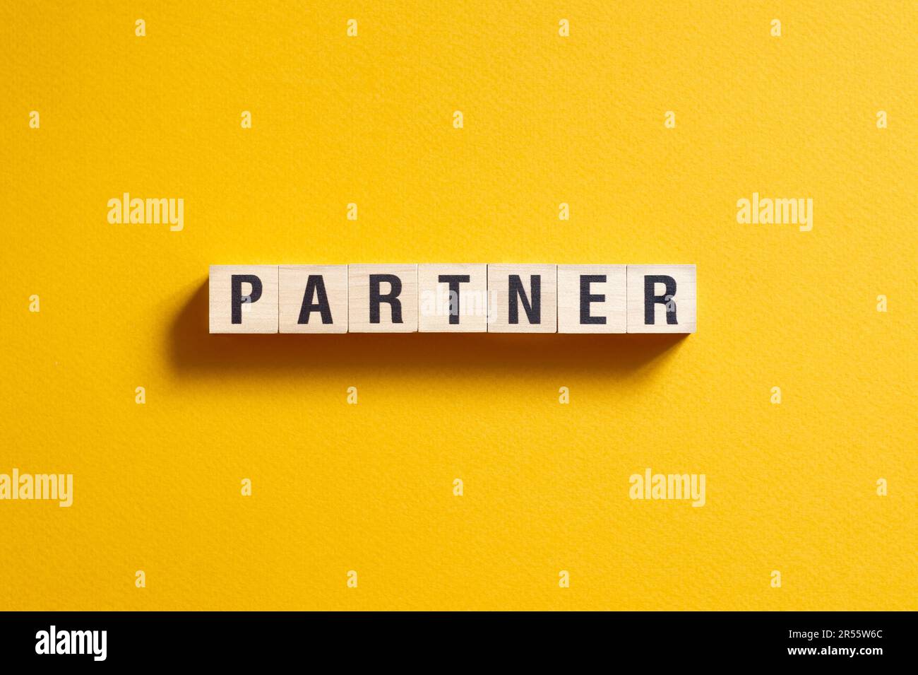 Partner - word concept on cubes, text, letters Stock Photo - Alamy