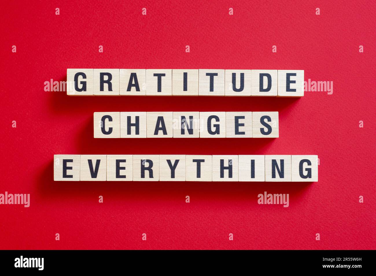 Gratitude changes everything - word concept on cubes, text, letters ...