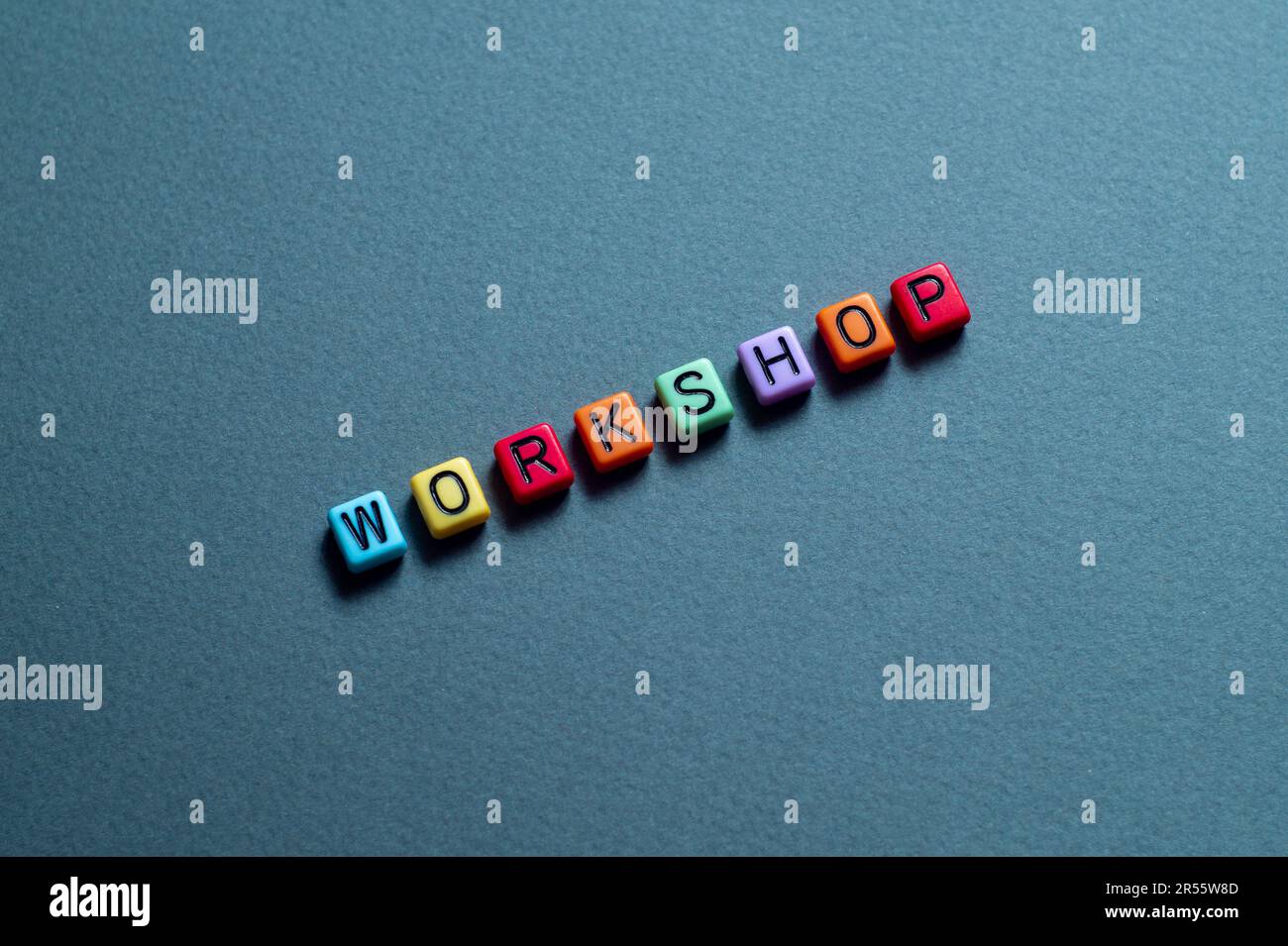 Workshop - word concept on cubes Stock Photo - Alamy