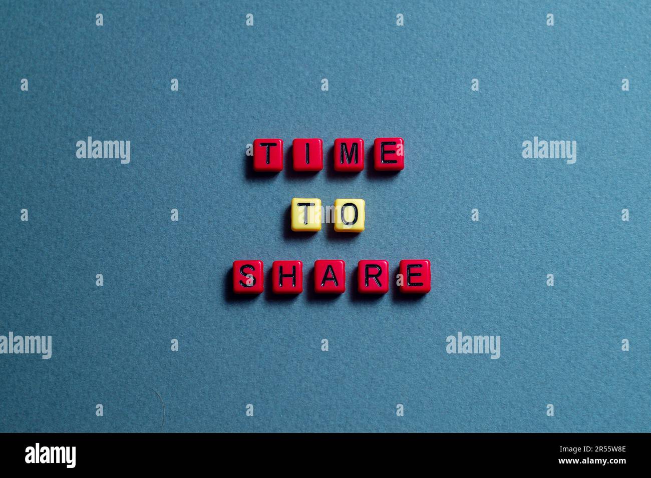 Time to share - word concept on cubes, text Stock Photo - Alamy