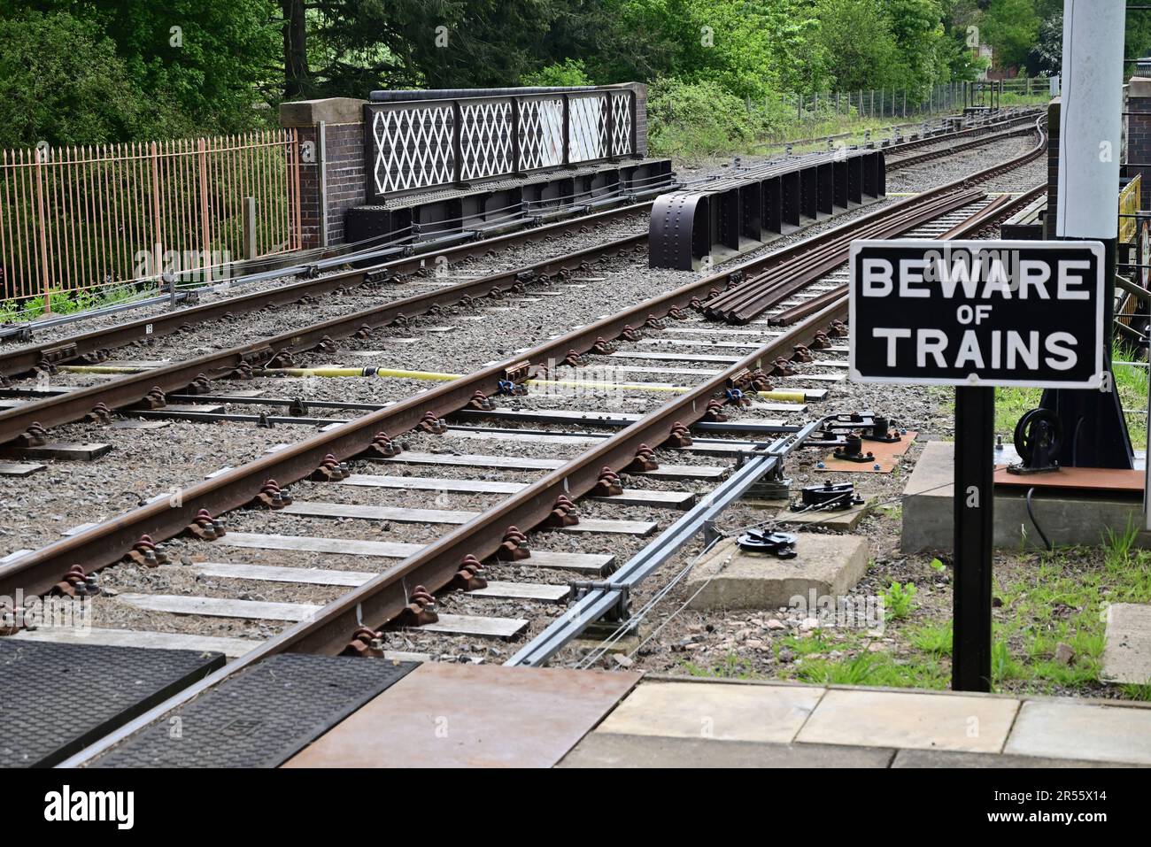 Beware of Trains sign beside a foot crossing at Broadway station on the ...