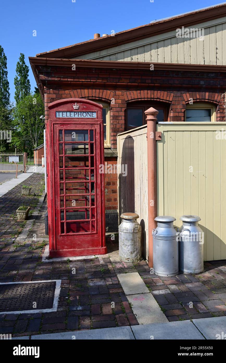 A red telephone box and milk churns at Toddington station on the ...