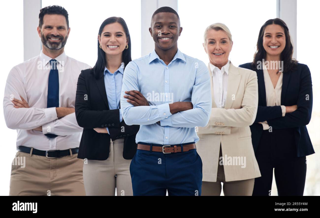 Portrait, leadership and arms crossed with a business team standing ...