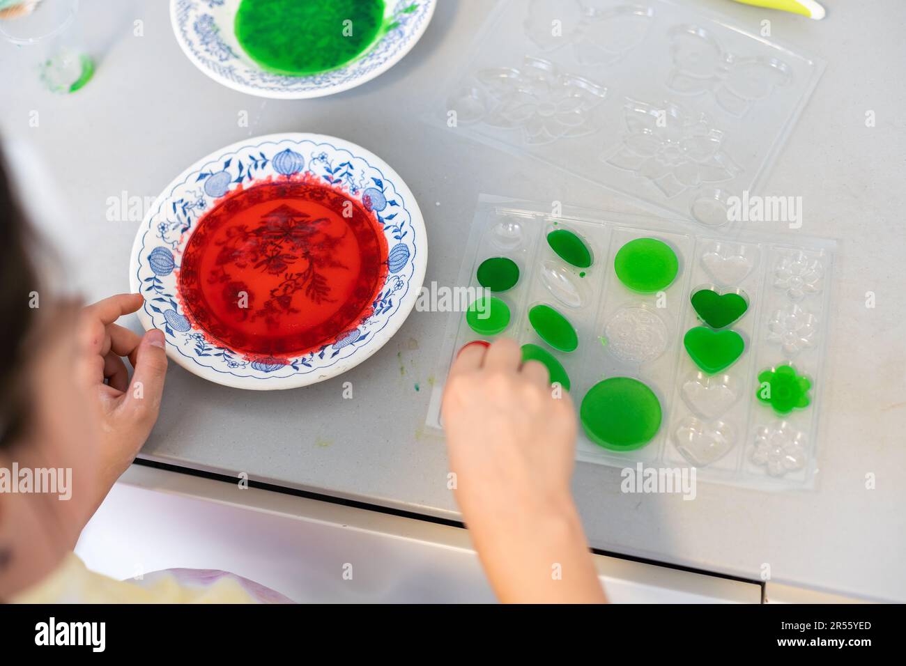child learning research and doing a chemical experiment while making ...