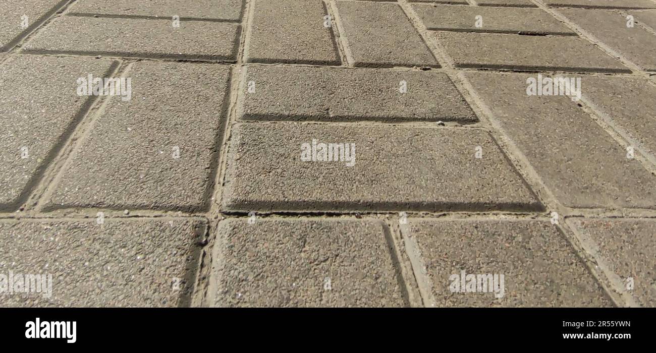 Pavement with bricks, road background, road surface close view Stock ...