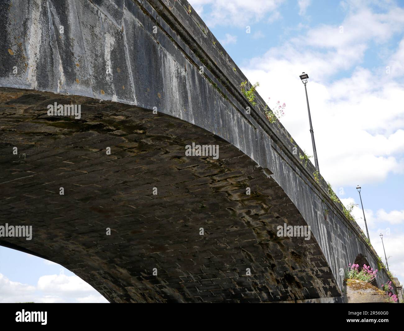 Old stone bridge in Ireland, ancient bridge made of stones and bricks ...