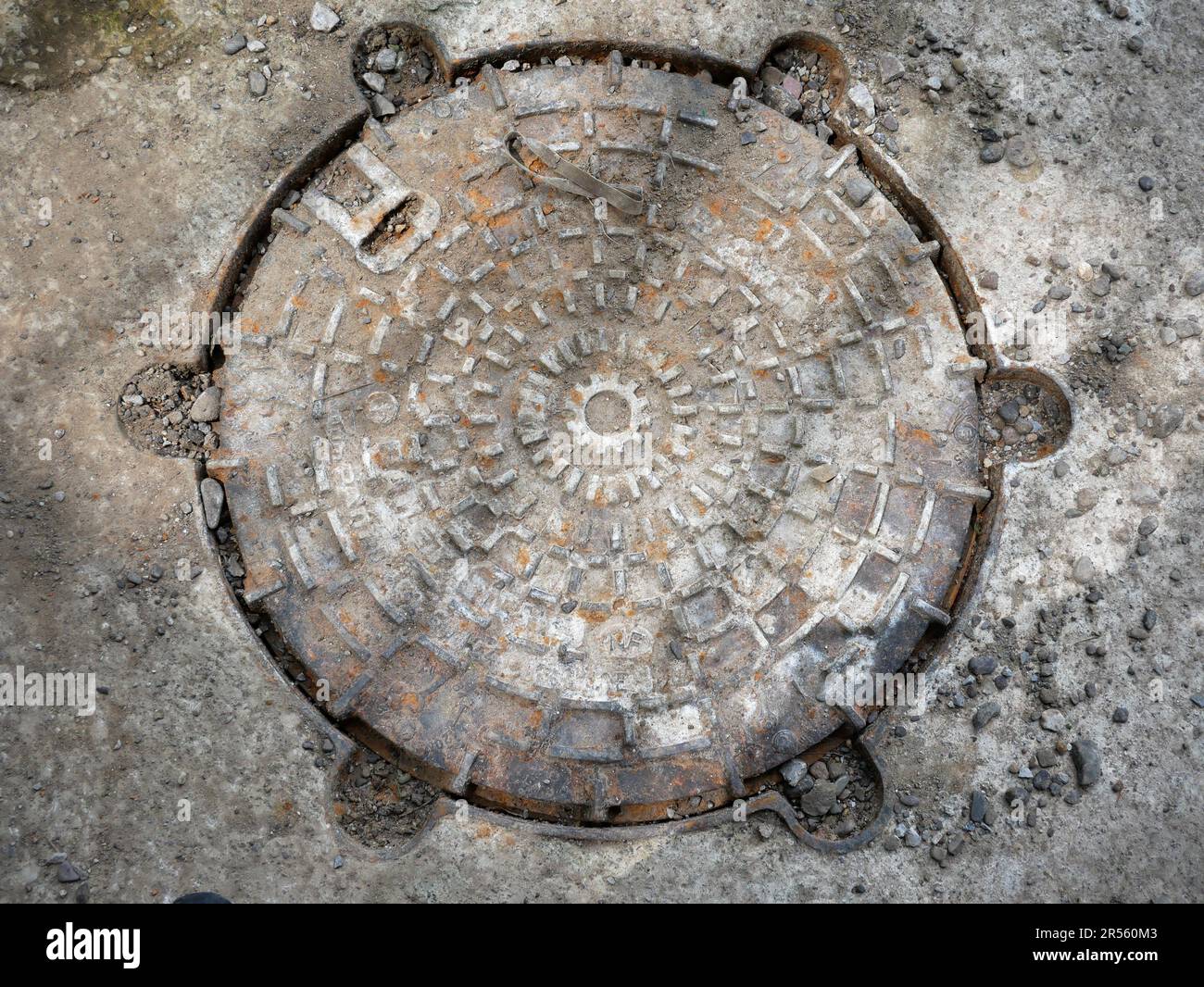 Manhole grunge style background, ground close view photo Stock Photo ...