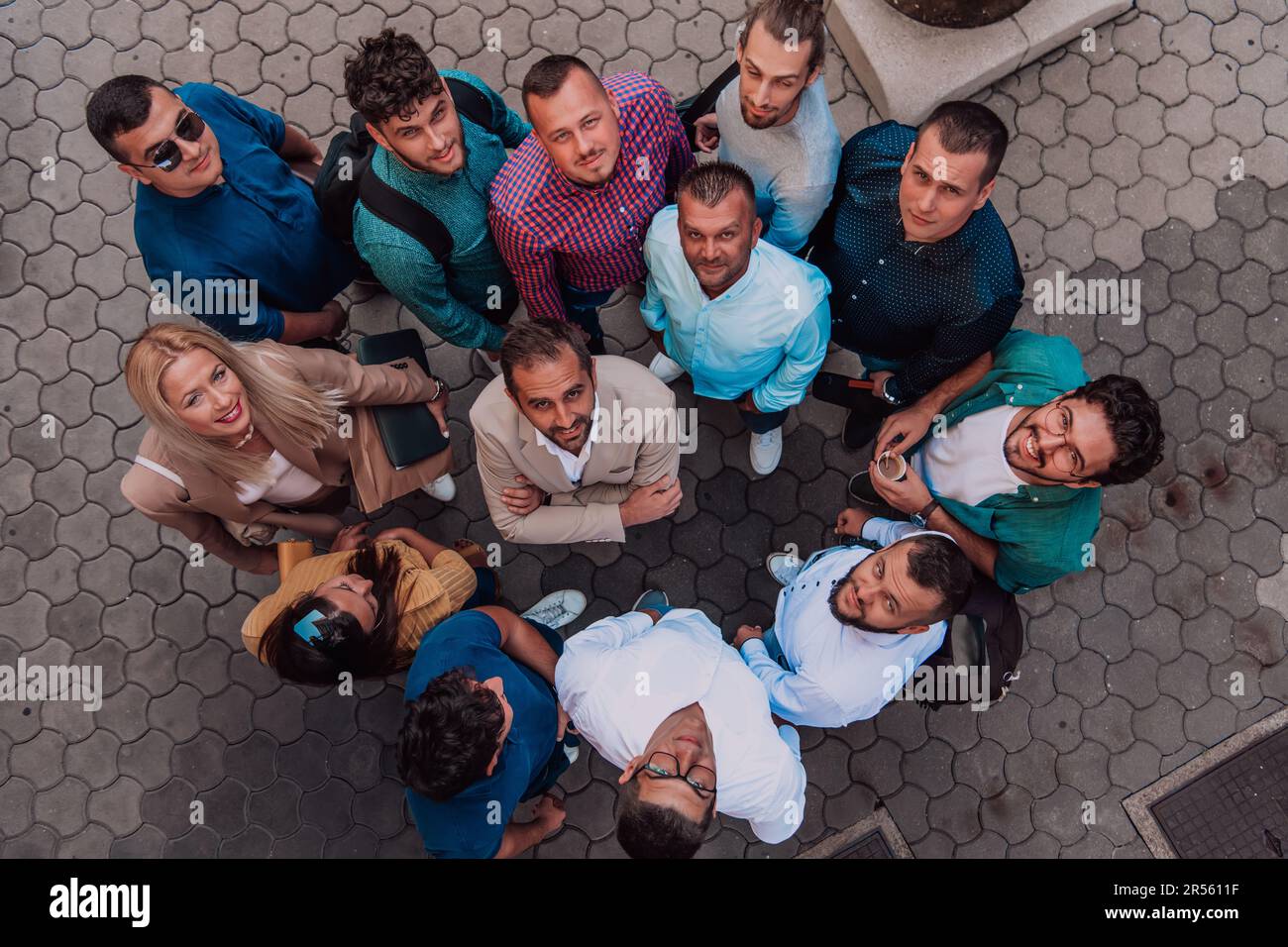 A top view photo of group of businessmen and colleagues standing ...
