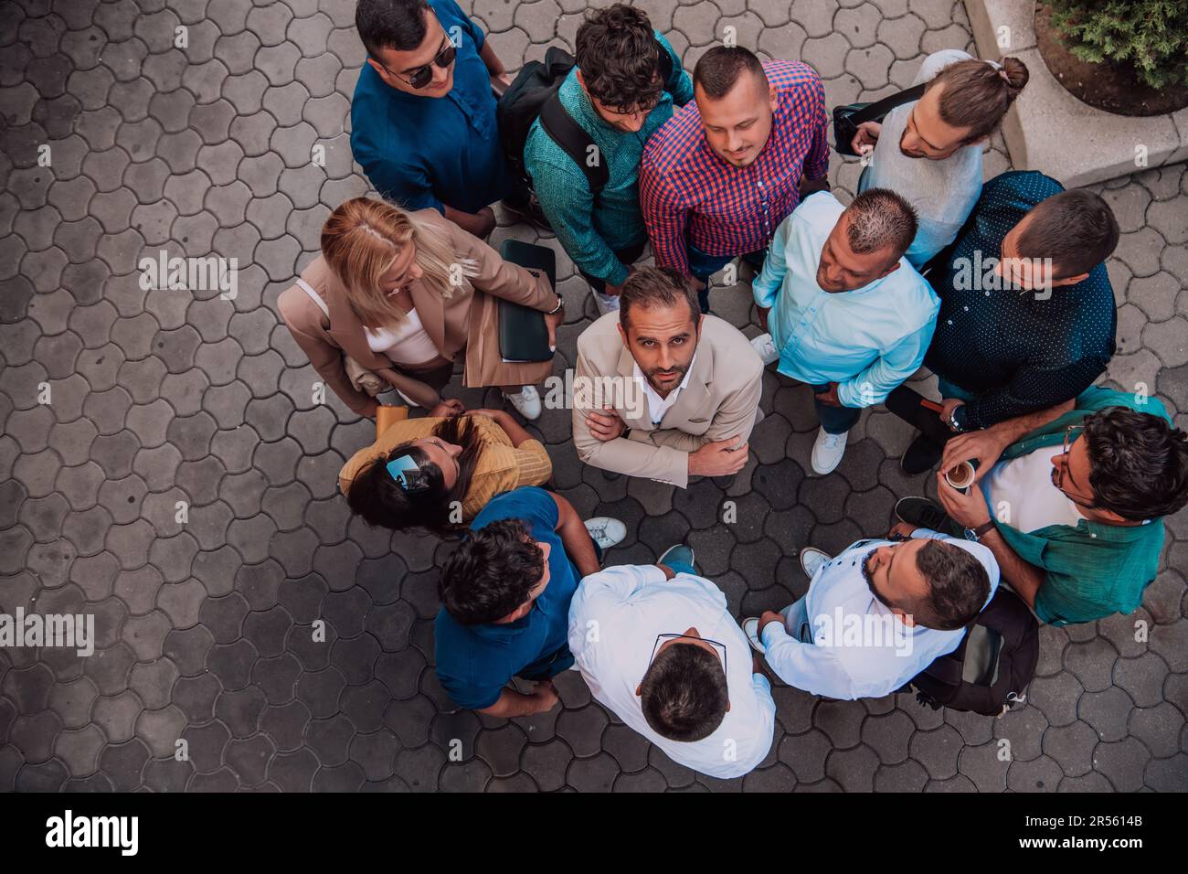 A top view photo of group of businessmen and colleagues standing ...