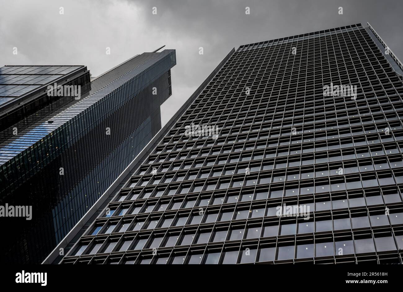 London, UK: Looking up at 100 Bishopsgate a tall skyscraper in the City ...