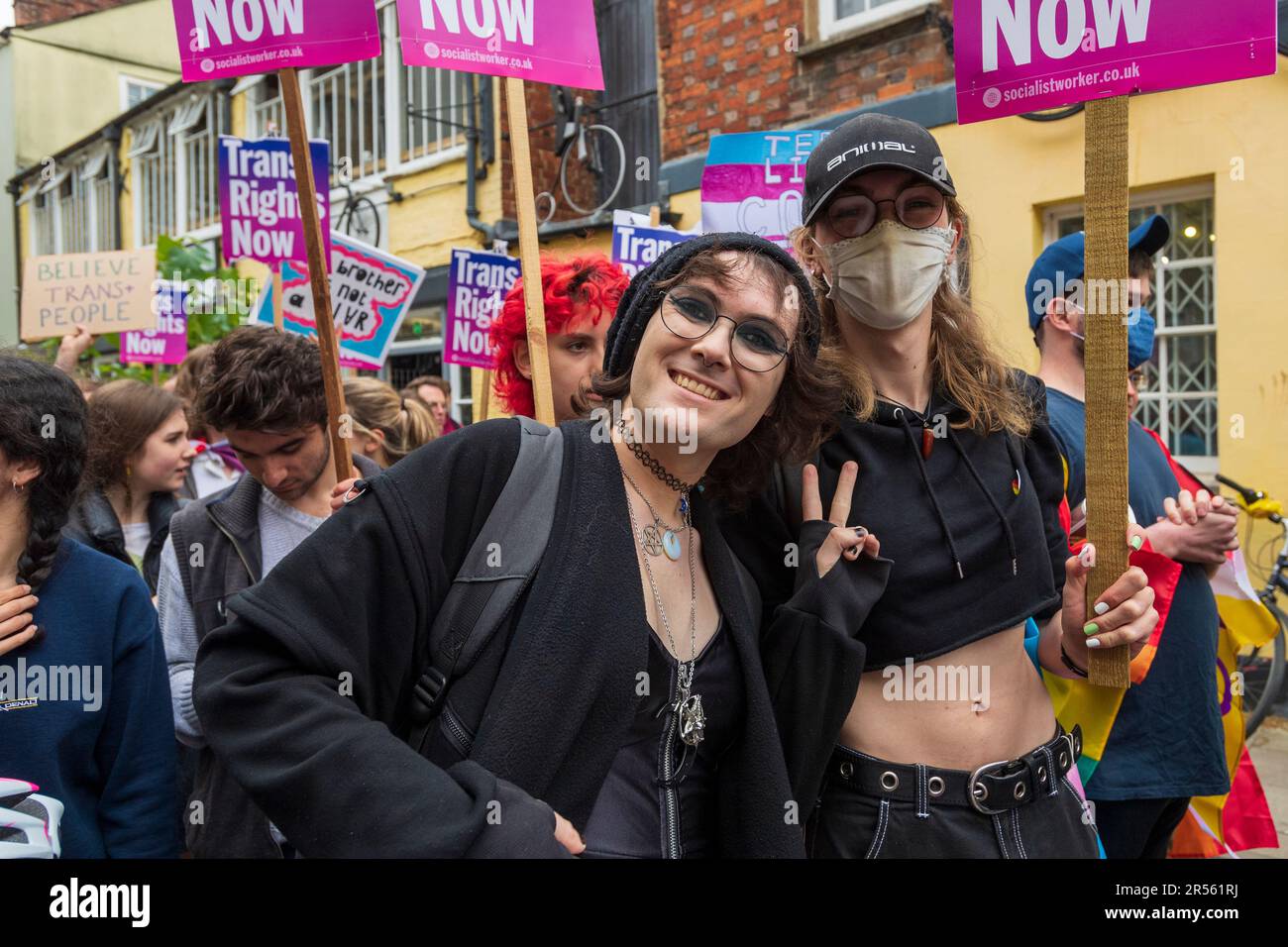 A group of pro-trans rights advocates are peacefully protesting outside ...