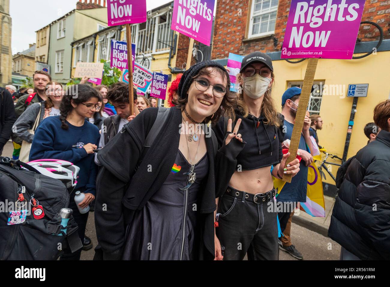 A group of pro-trans rights advocates are peacefully protesting outside ...
