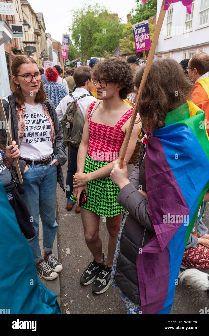 A group of pro-trans rights advocates are peacefully protesting outside ...