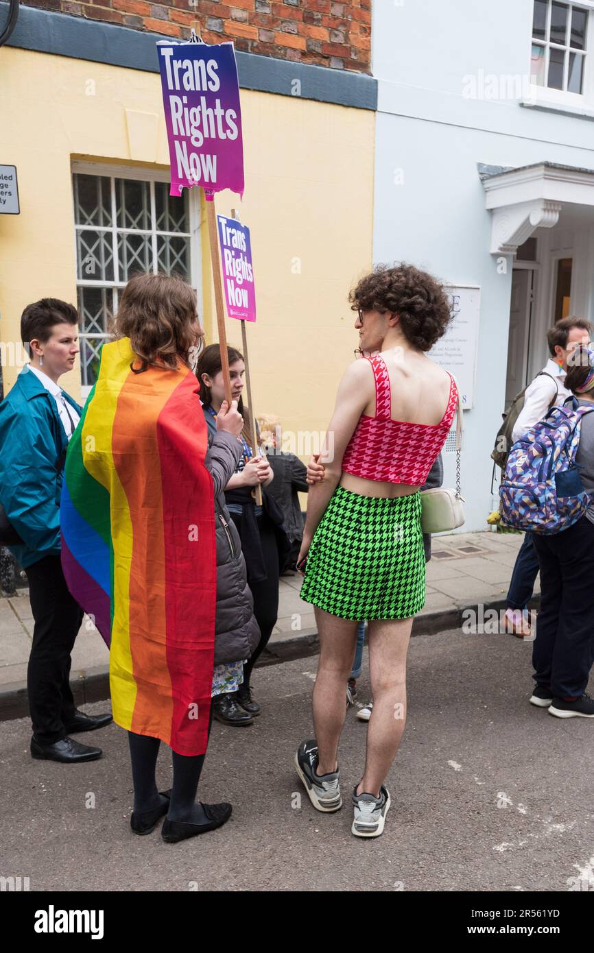 A group of pro-trans rights advocates are peacefully protesting outside ...