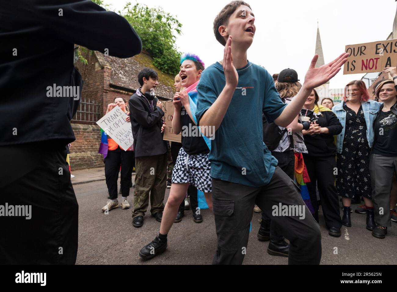 A group of pro-trans rights advocates are peacefully protesting outside ...