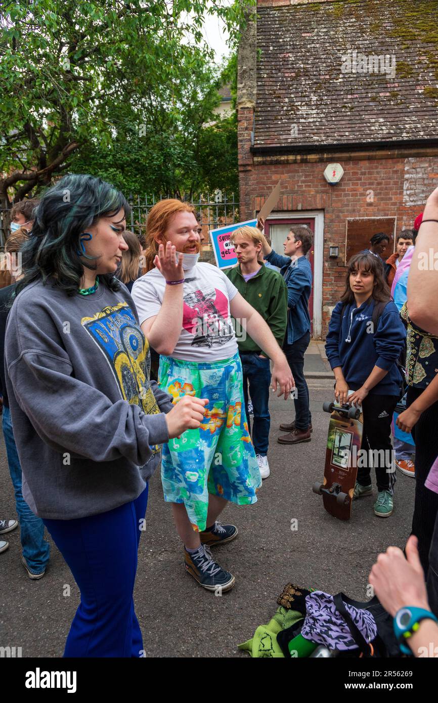 A group of pro-trans rights advocates are peacefully protesting outside ...
