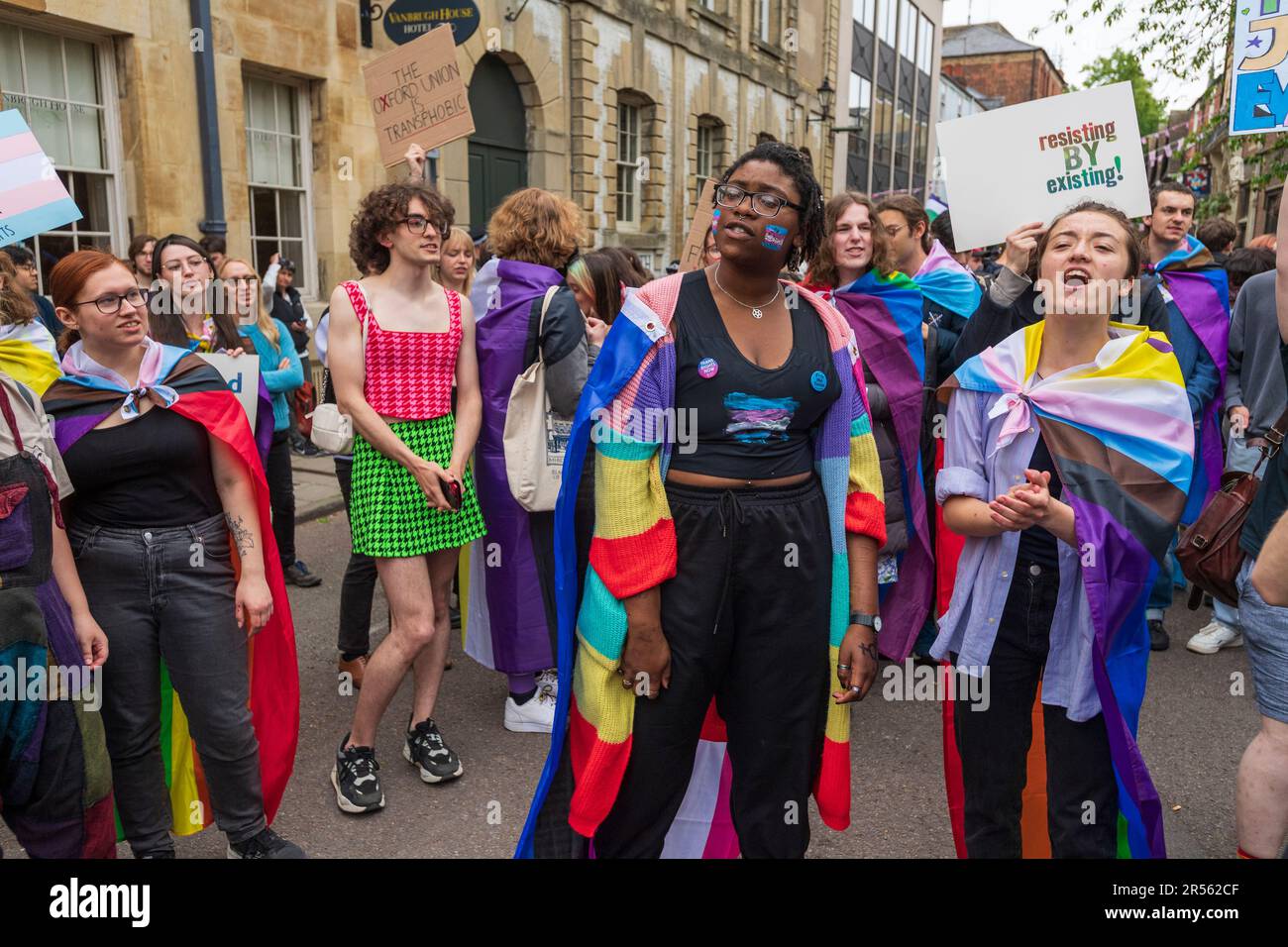 A group of pro-trans rights advocates are peacefully protesting outside ...