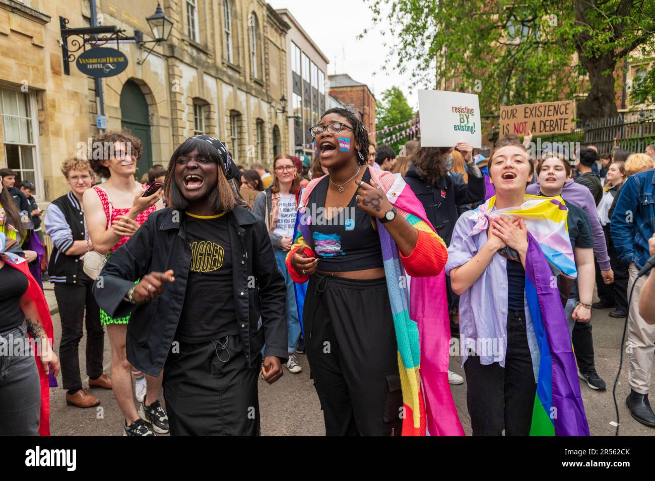 A group of pro-trans rights advocates are peacefully protesting outside ...