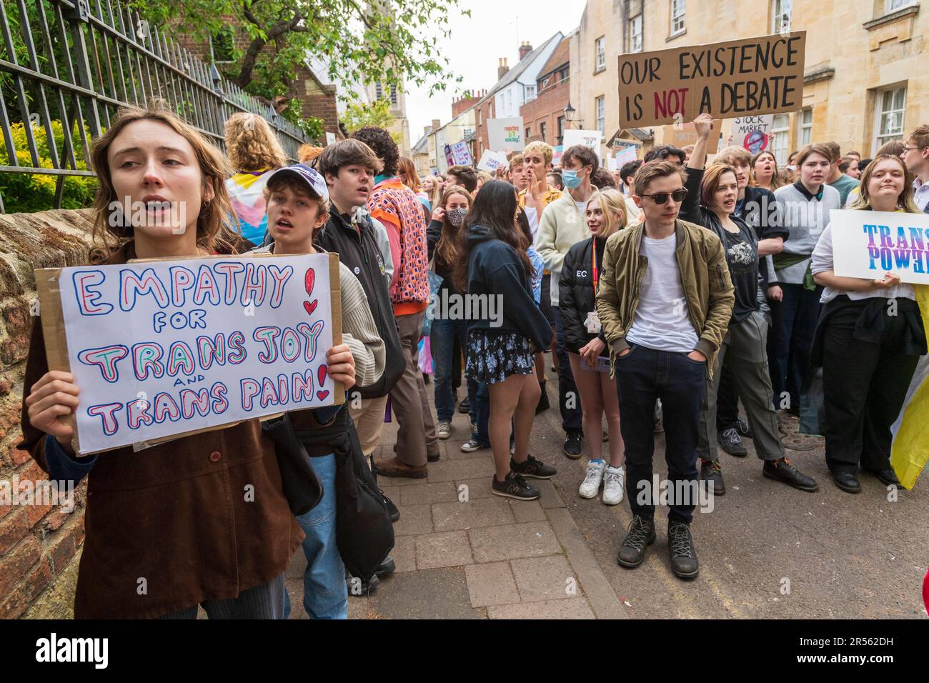 A group of pro-trans rights advocates are peacefully protesting outside ...