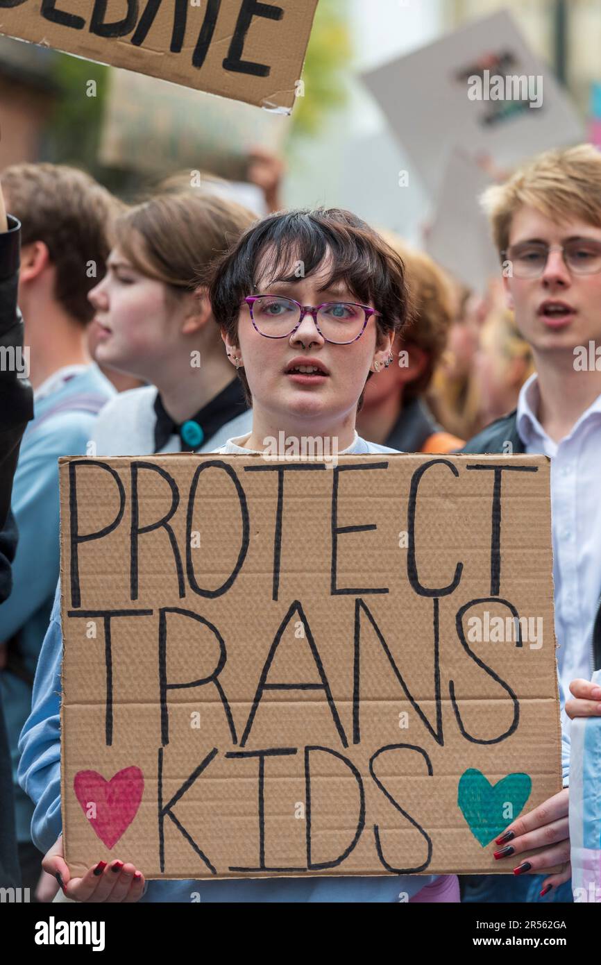 A group of pro-trans rights advocates are peacefully protesting outside ...