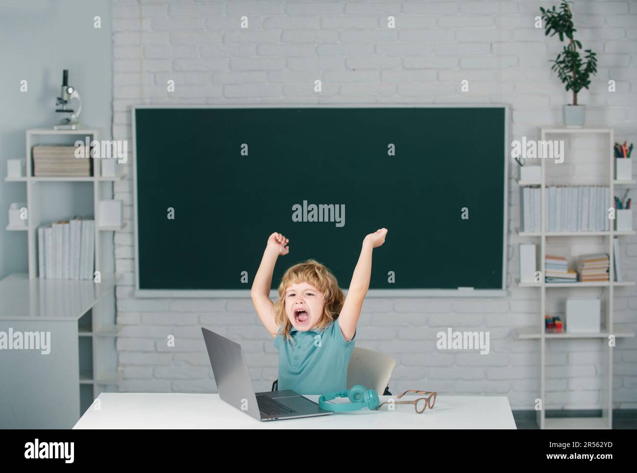 Angry sad screaming kid boy shouting on lesson at school, making ...