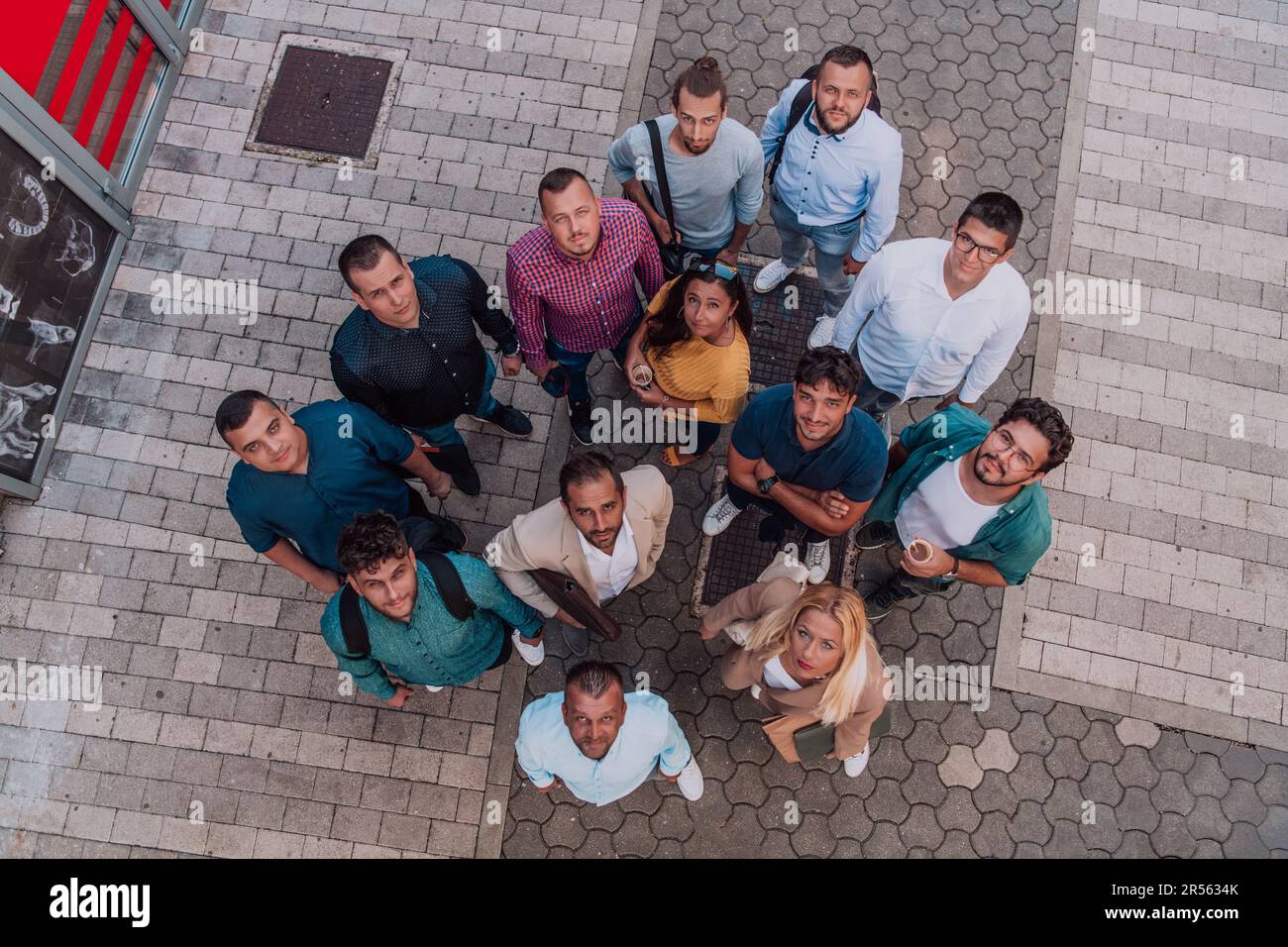 A top view photo of group of businessmen and colleagues standing ...