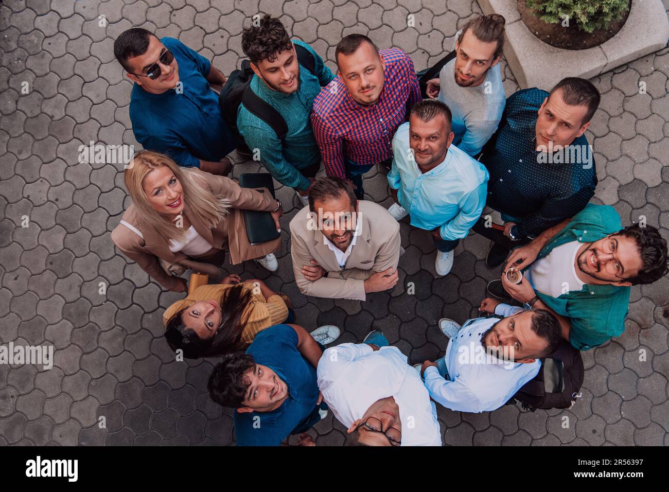 A top view photo of group of businessmen and colleagues standing ...
