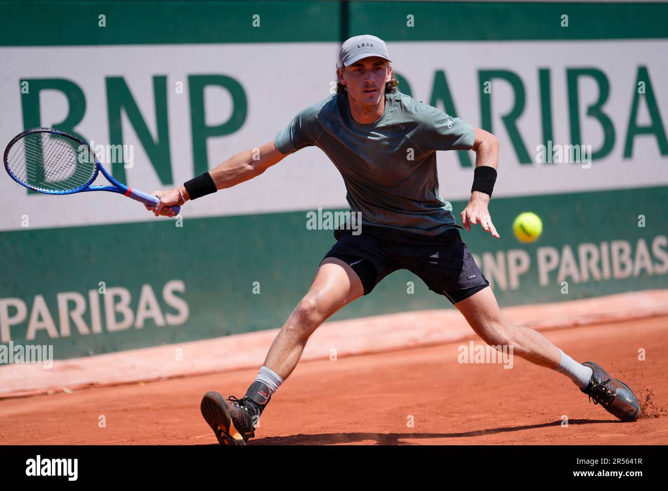 Australia's Max Purcell plays a shot against Japan's Yoshihito Nishioka ...