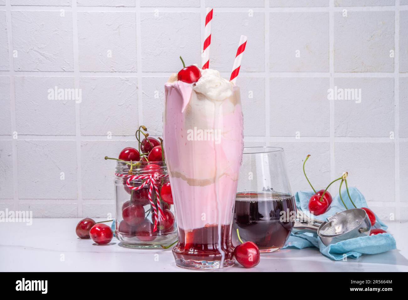 Sweet homemade cherry-cola milkshake with whipped cream, ice cream ...